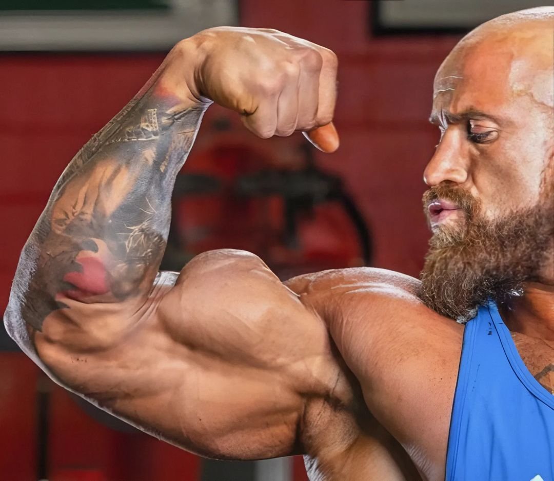 The 10 Commandments Of Building Big Strong Biceps Tikkay Khan